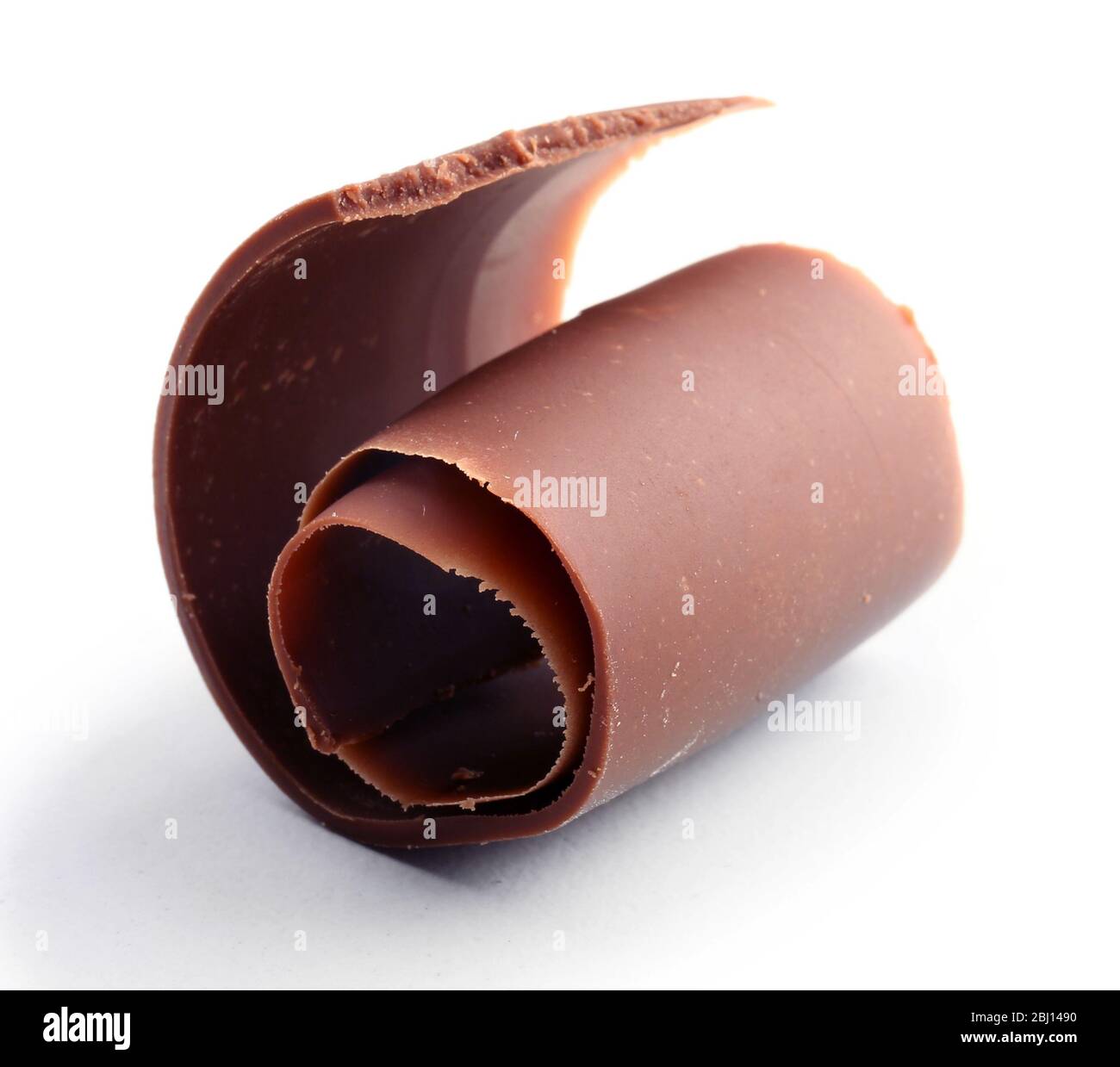 Chocolate curl isolated on white Stock Photo - Alamy