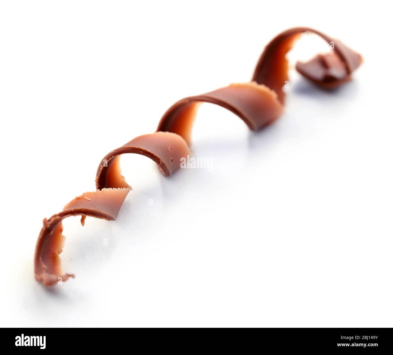 Chocolate curl isolated on white Stock Photo - Alamy
