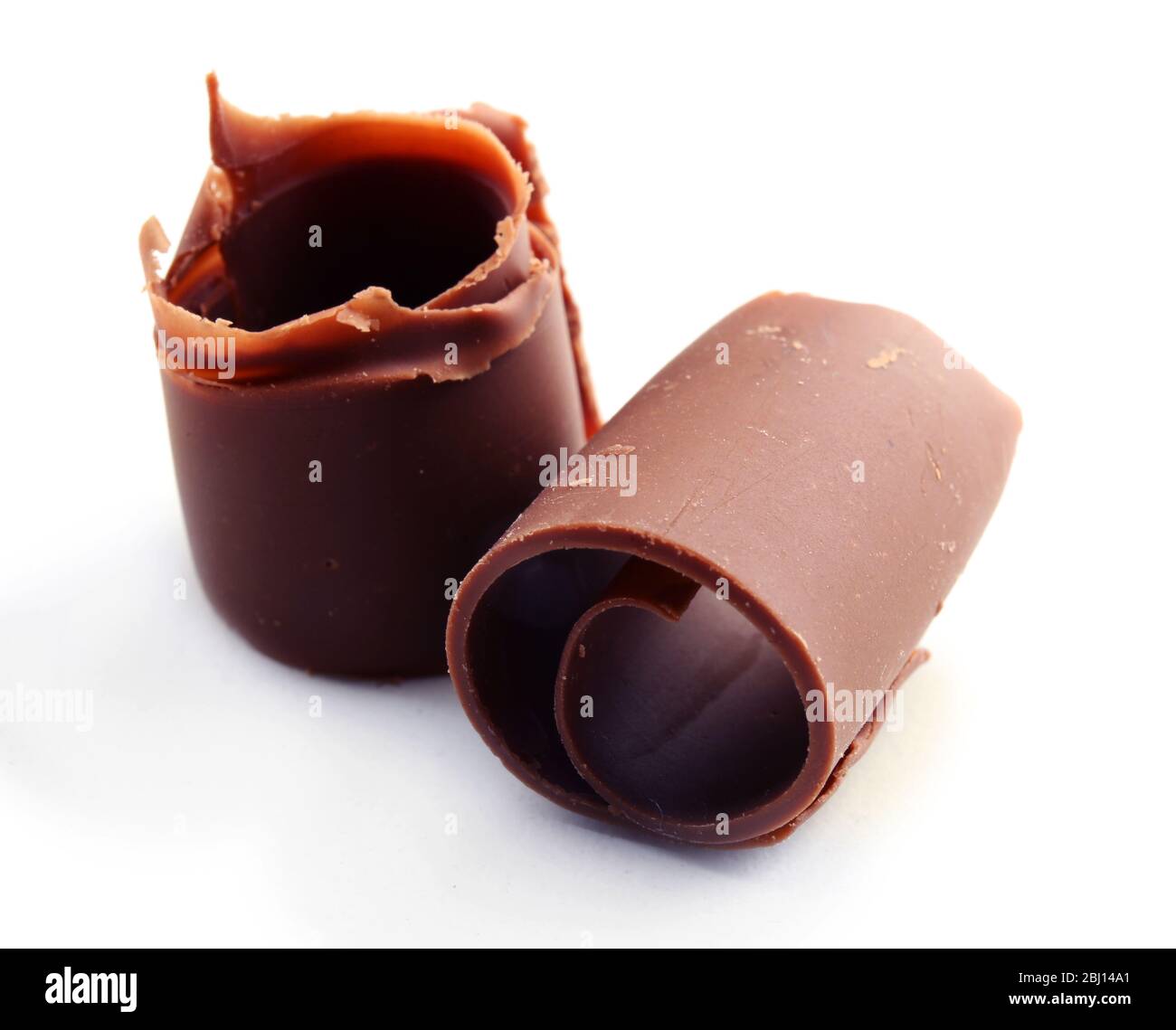 Chocolate curls isolated on white Stock Photo - Alamy