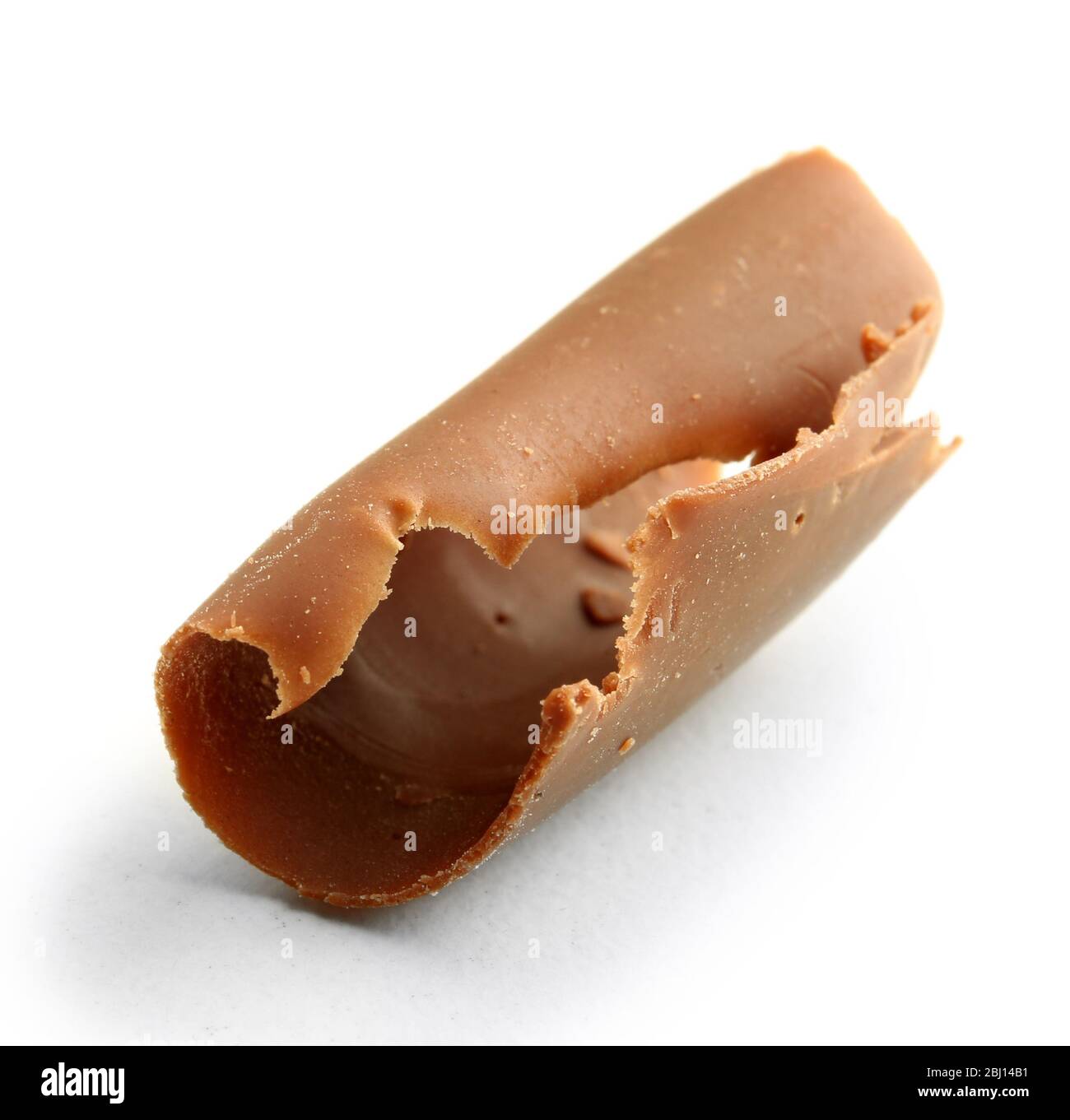Chocolate curl isolated on white Stock Photo - Alamy
