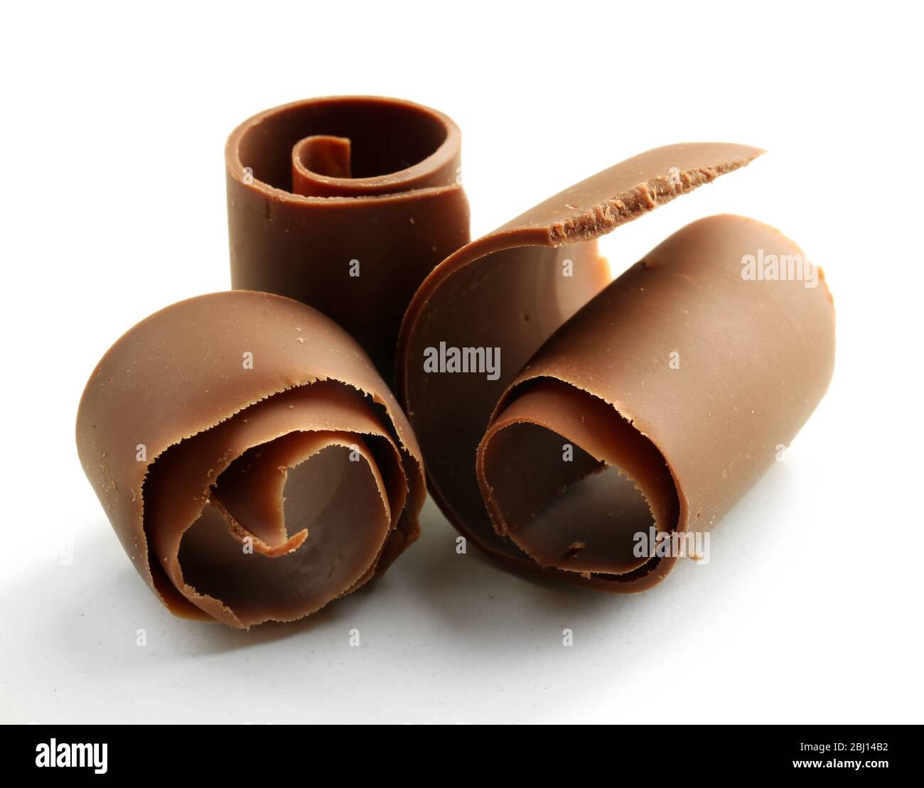 Chocolate curls isolated on white Stock Photo - Alamy