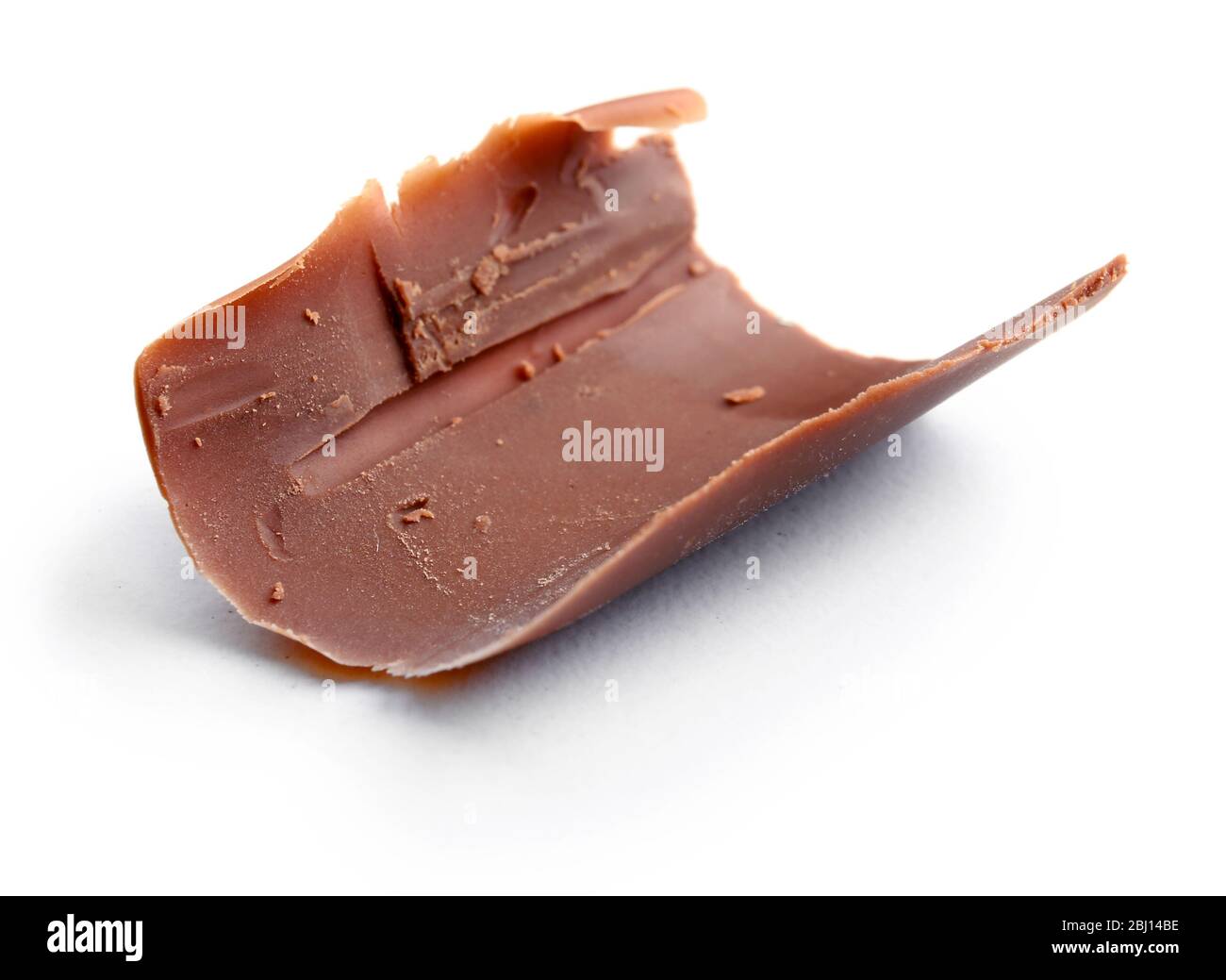 Chocolate curl isolated on white Stock Photo - Alamy