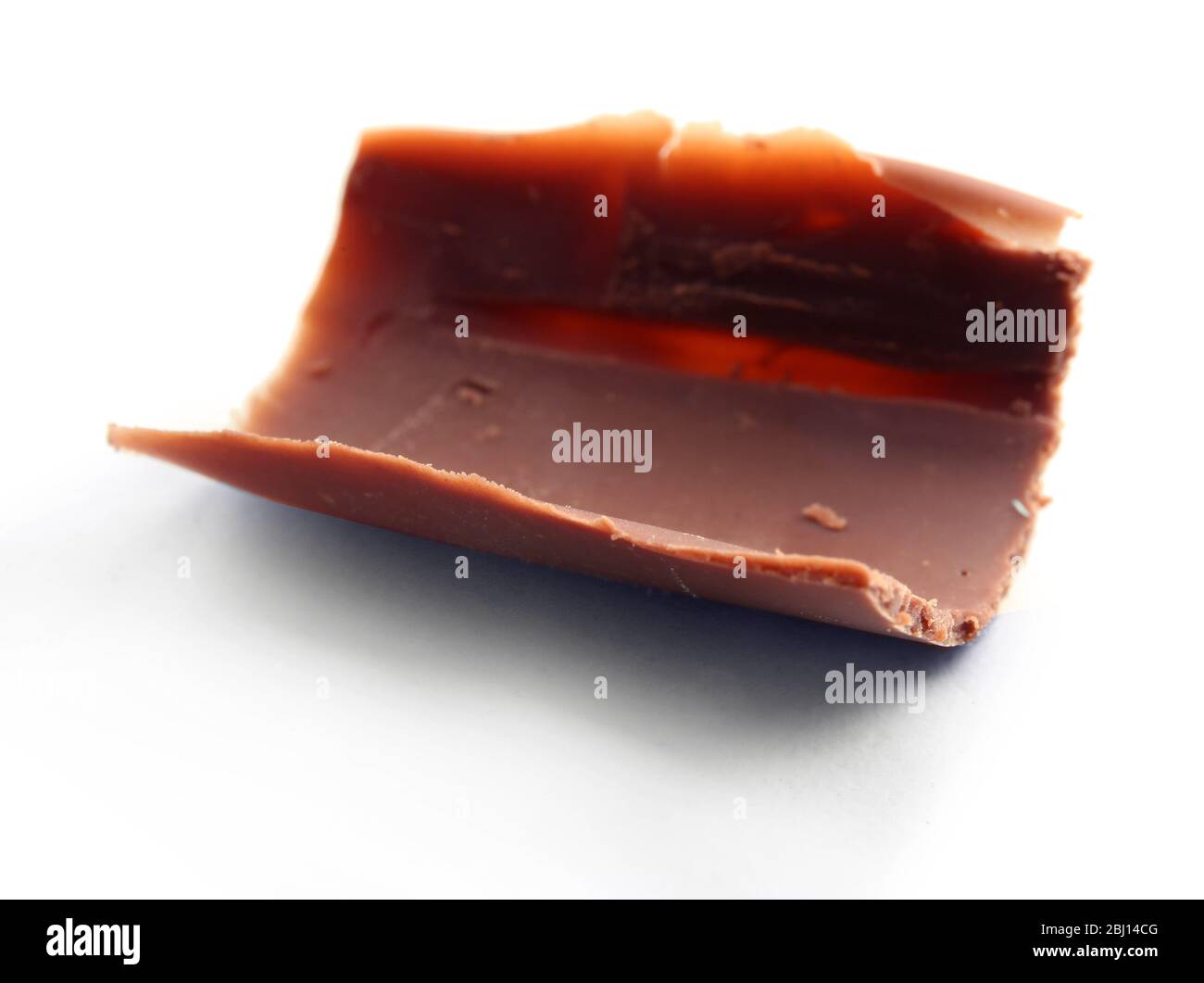 Chocolate curl isolated on white Stock Photo - Alamy