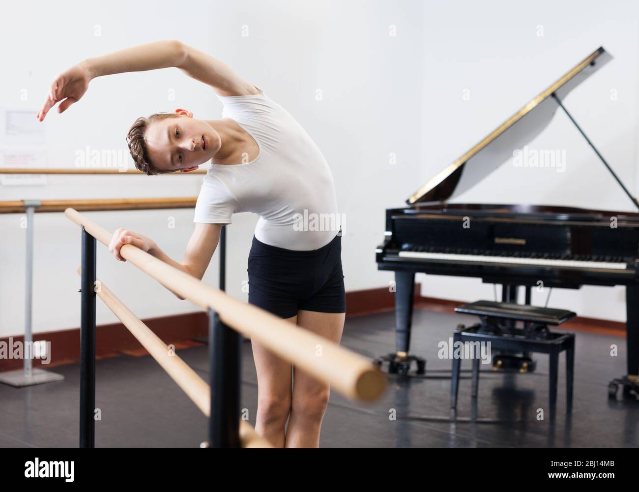 Young dancer practicing in a ballroom studio Stock Photo - Alamy