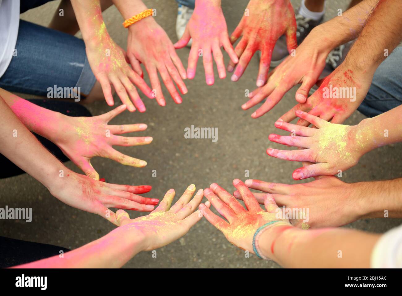 Hands of young people with Indian dyes on Holi color festival Stock ...