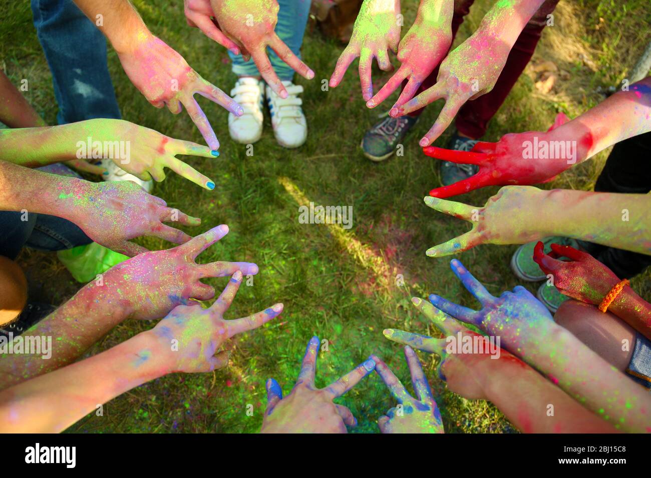 Hands of young people with Indian dyes on Holi color festival Stock ...