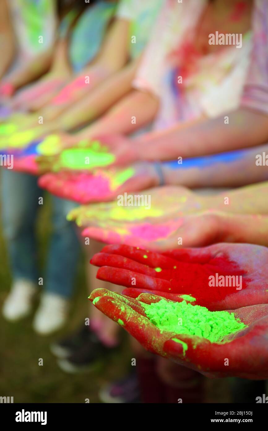 Hands of young people with Indian dyes on Holi color festival Stock ...
