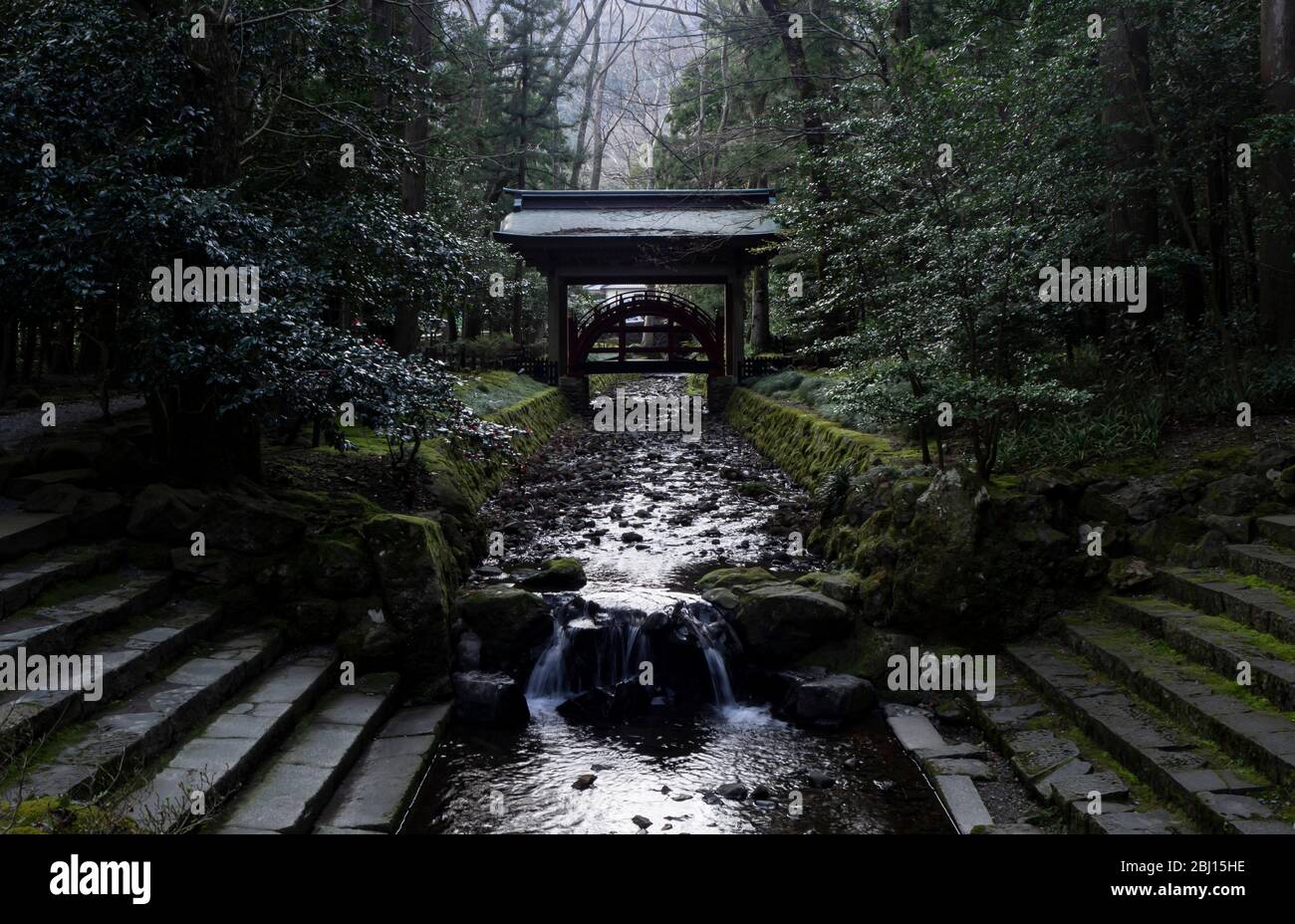 Bridge over a stream Stock Photo - Alamy