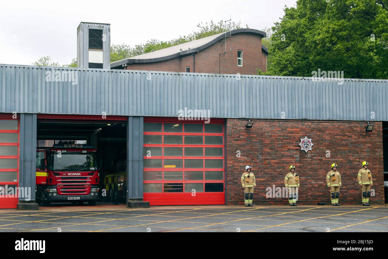 Firefighters outside Godstone fire station during a minute's silence to ...