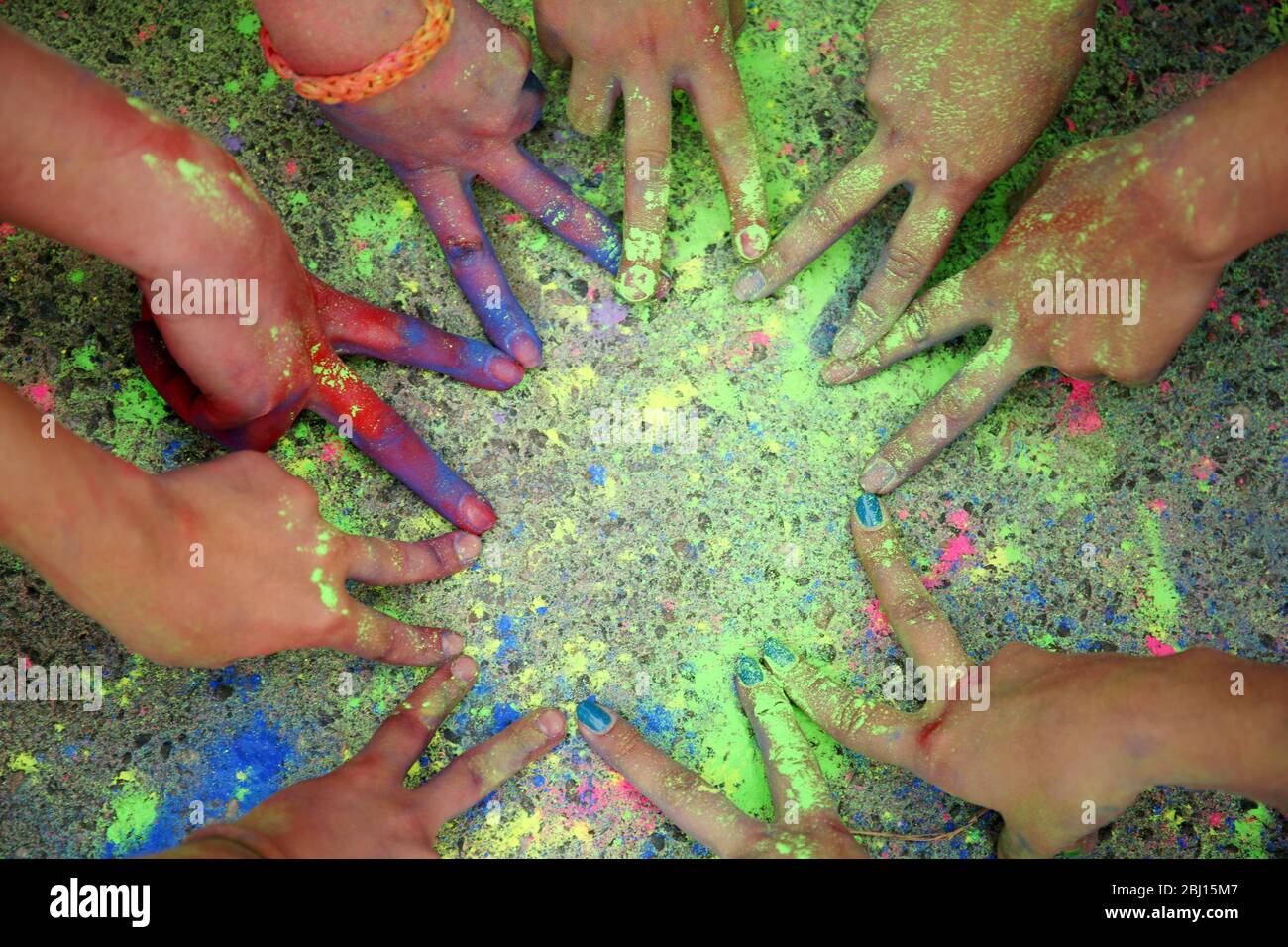 Hands of young people with Indian dyes on Holi color festival Stock ...