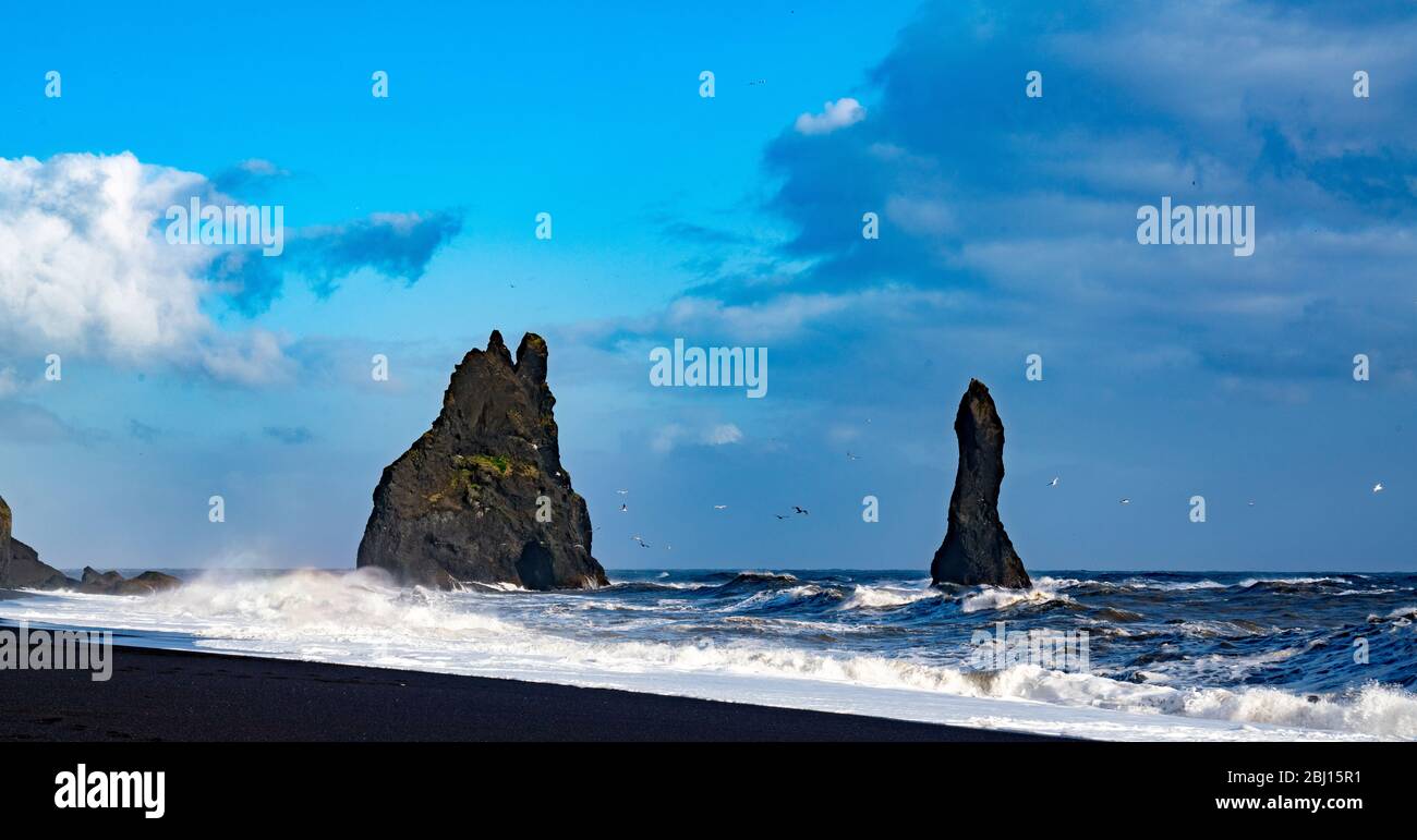 The cliffs by the township of Vik in Iceland Reynisdrangar basalt sea ...