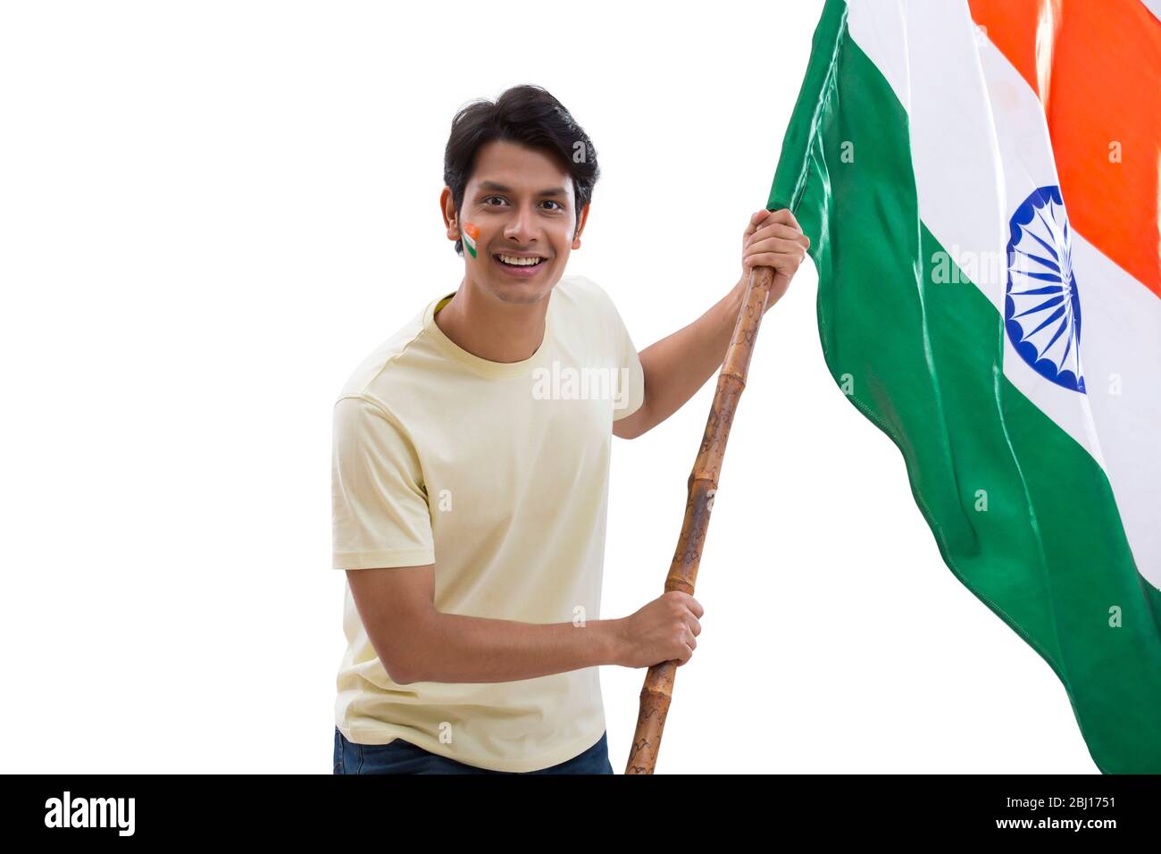 young man waving national flag in excitement, independence day Stock ...