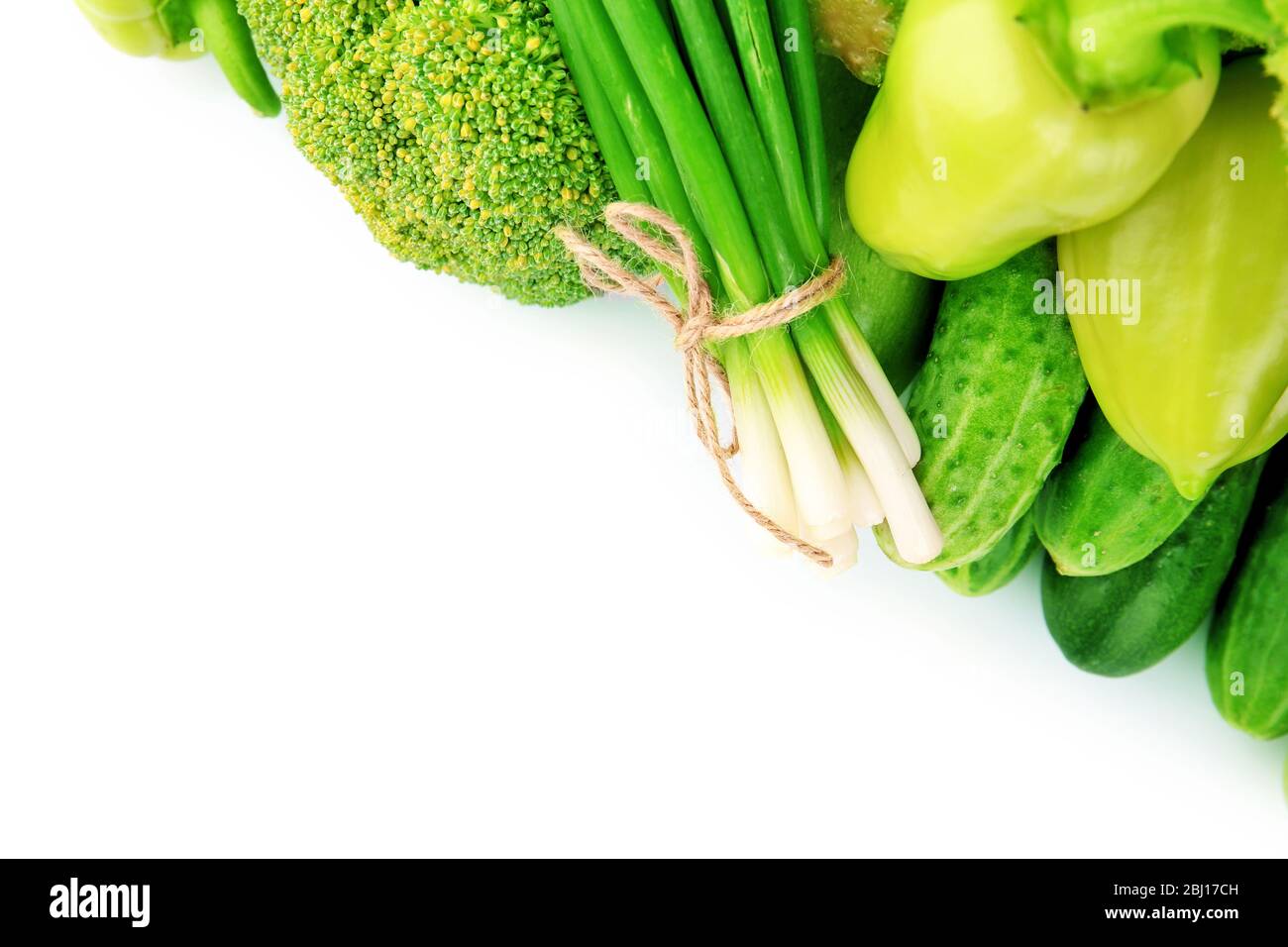 Heap of green vegetables isolated on white Stock Photo - Alamy
