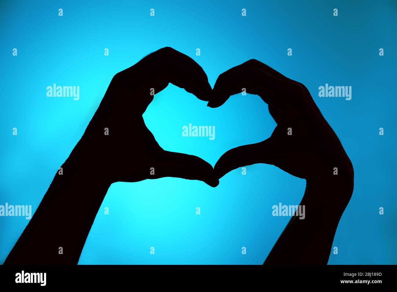 Silhouette of hands close up Stock Photo - Alamy