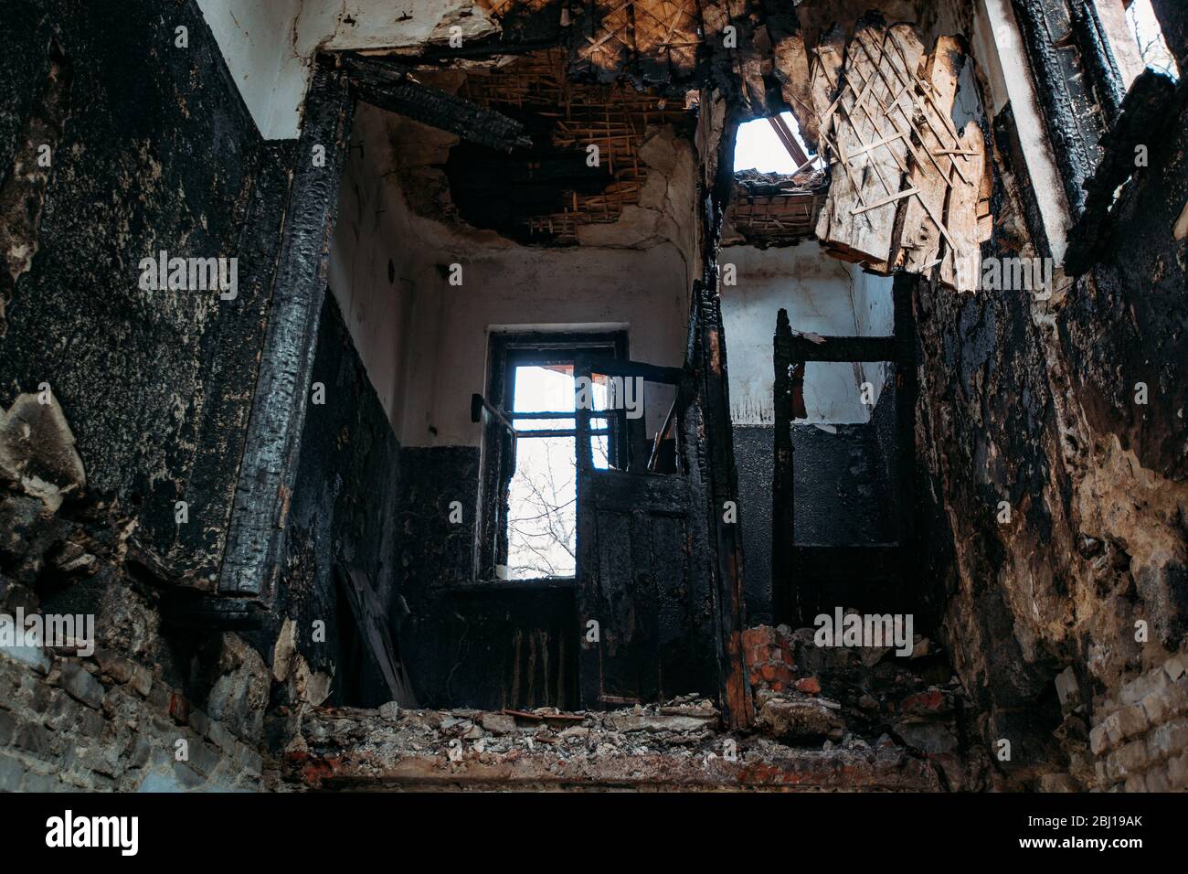 Burnt old rural house interior. Consequences of fire Stock Photo - Alamy