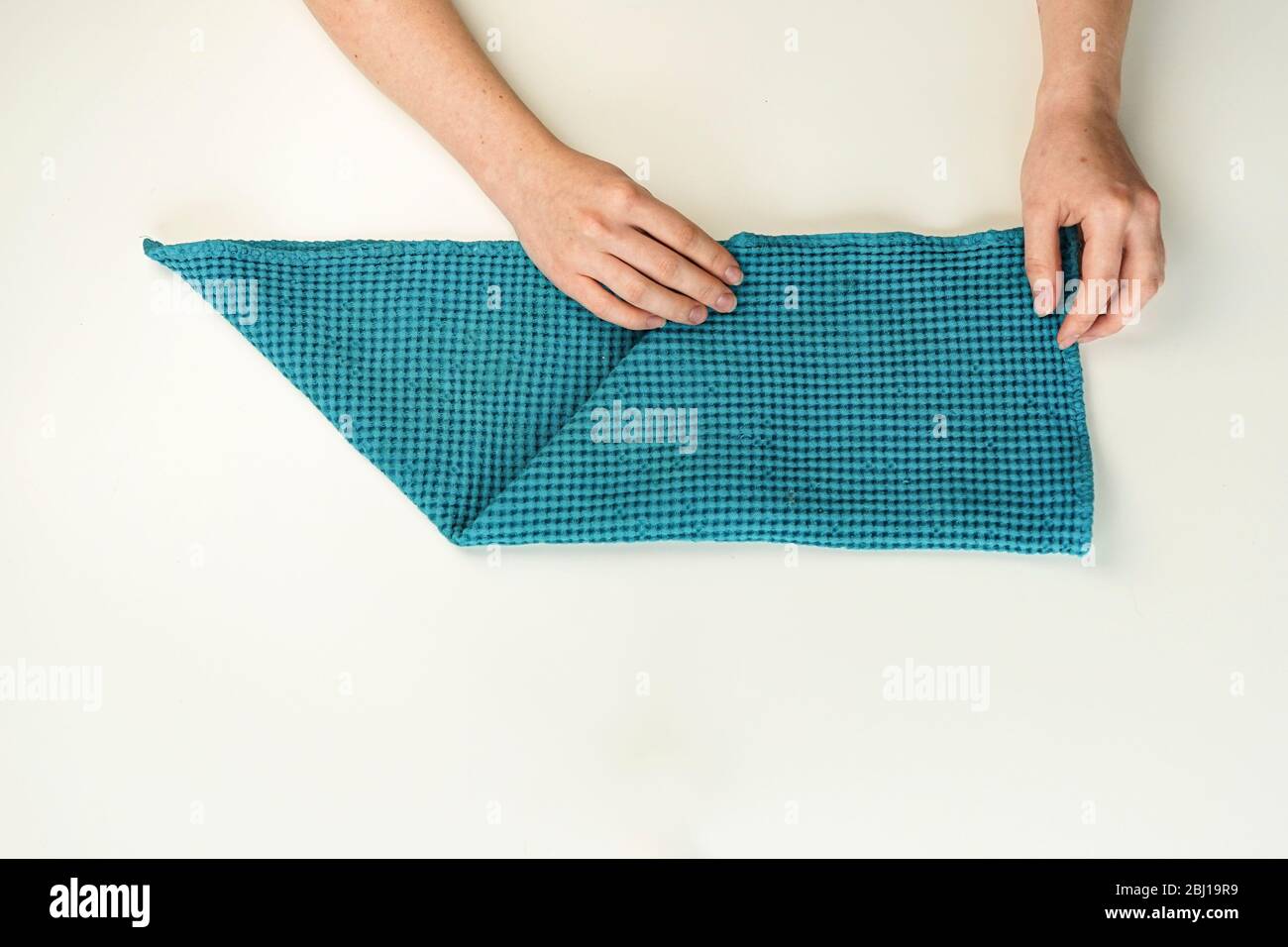 Horizontally folded hi-res stock photography and images - Alamy