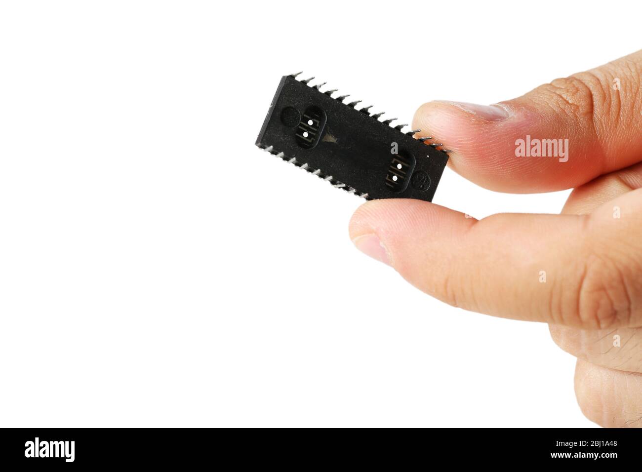 Male fingers holding microchip isolated on white Stock Photo - Alamy