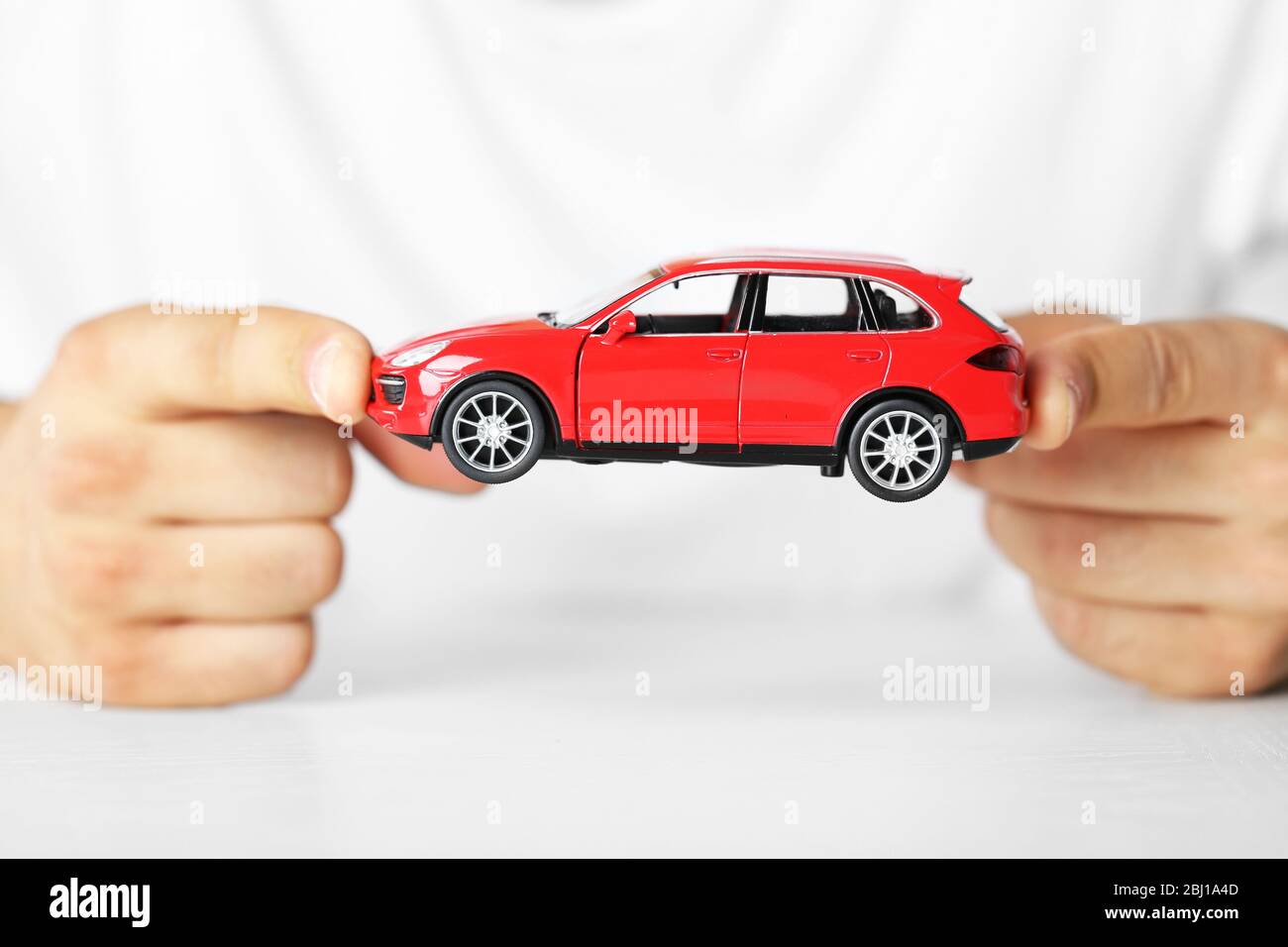 Male hands and car as protection of car concept Stock Photo - Alamy