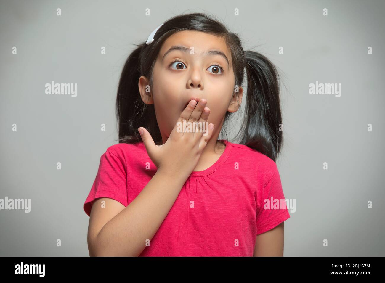 portrait of a young girl in shock Stock Photo - Alamy