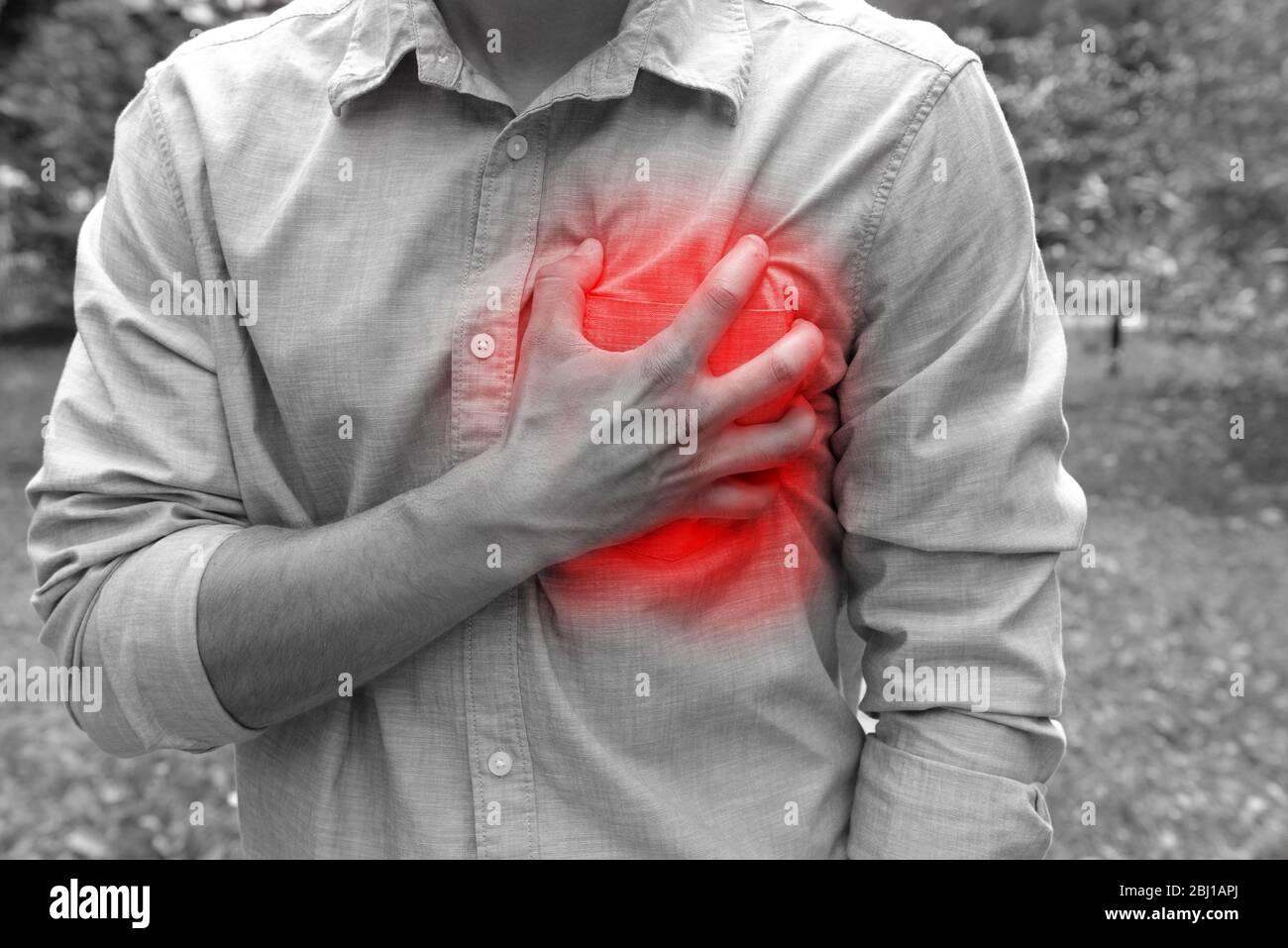 Man having chest pain - heart attack, outdoors Stock Photo - Alamy