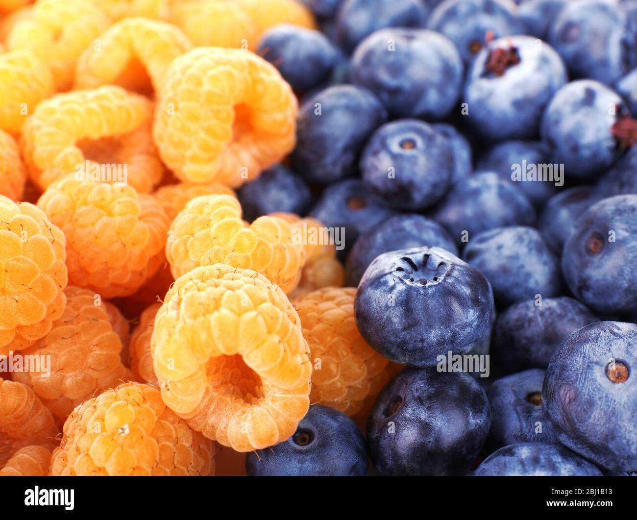 Mix of different berries as background Stock Photo - Alamy