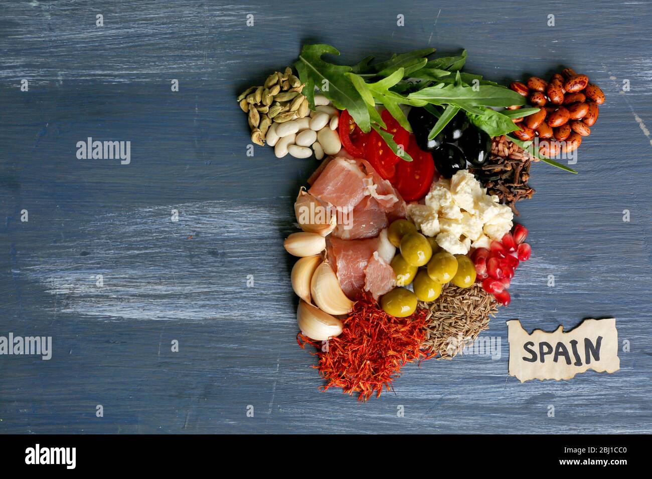 Map of Spain made with ingredients of traditional Spanish cuisine on ...
