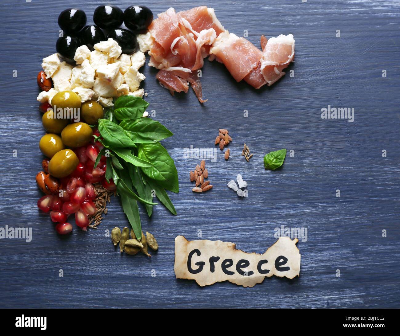 Map of Greece made with ingredients of traditional Greek cuisine on ...