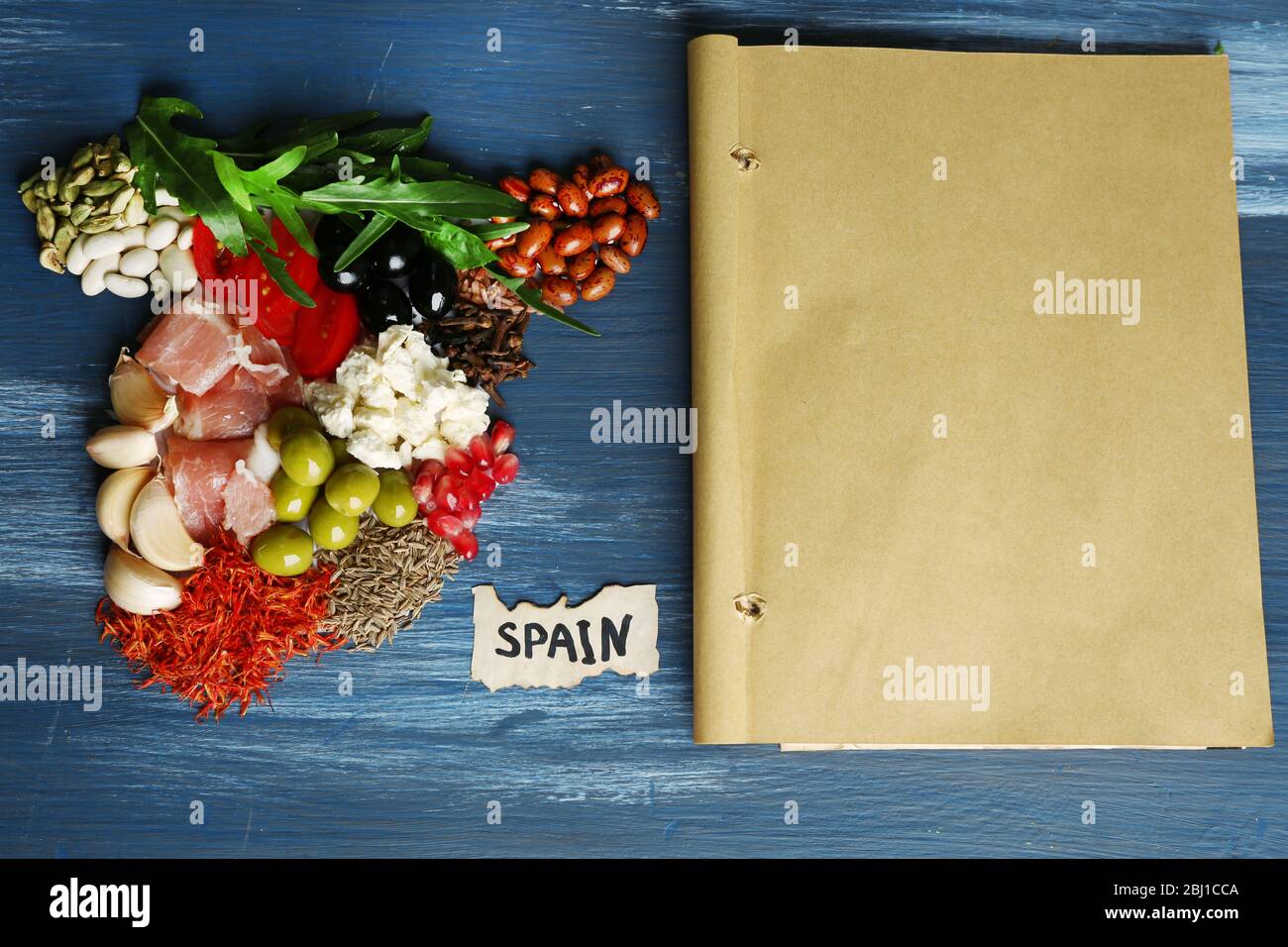 Map of Spain made with ingredients of traditional Spanish cuisine on ...