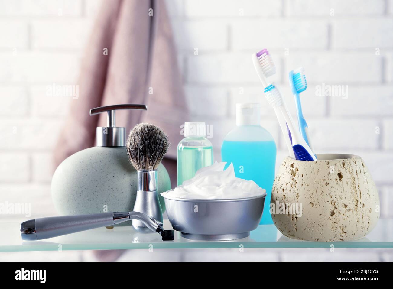 Male luxury shaving kit on shelf, on bricks wall background Stock Photo ...