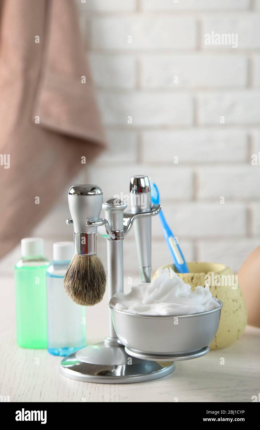 Male luxury shaving kit on shelf, on bricks wall background Stock Photo ...
