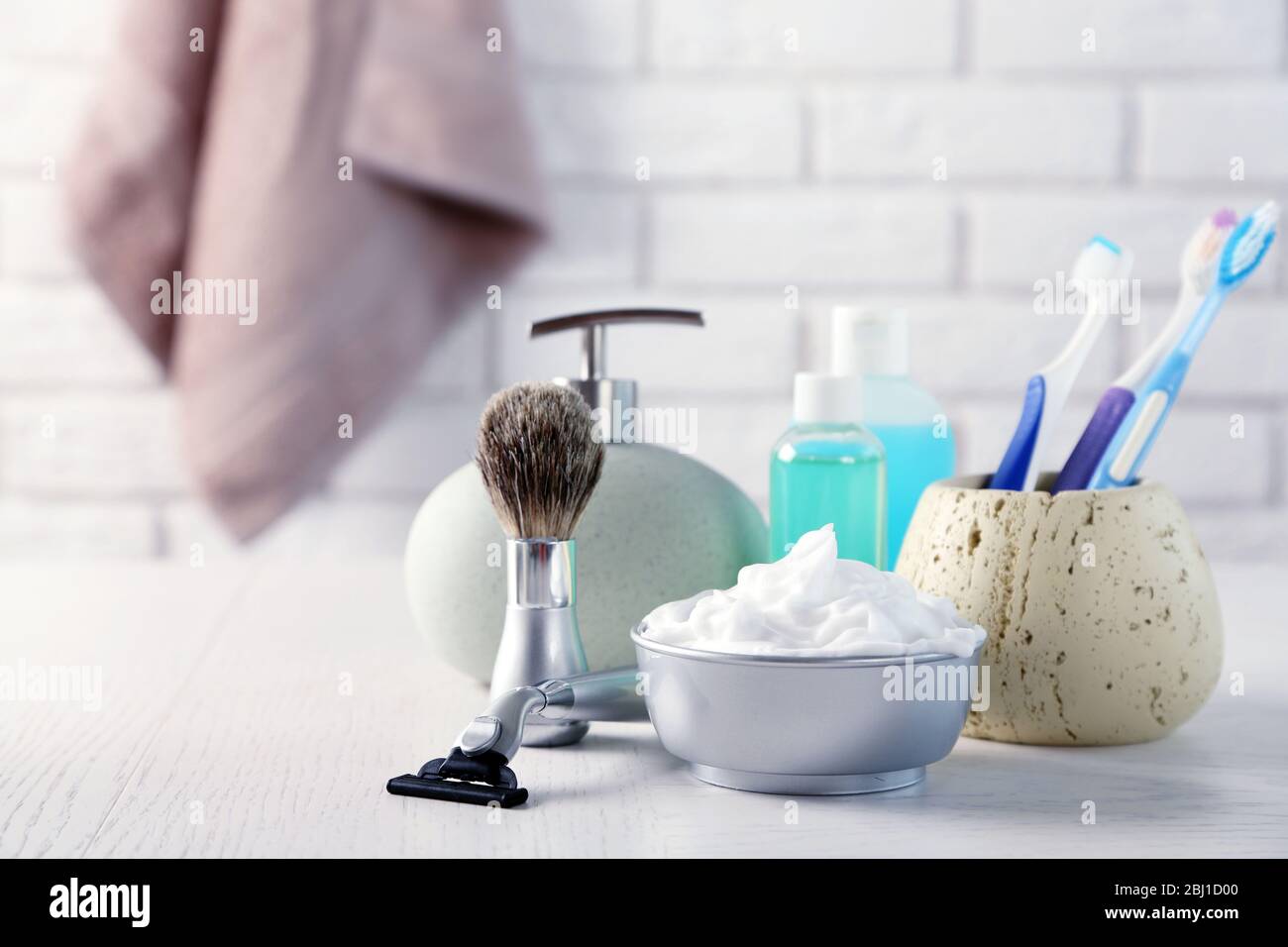 Male luxury shaving kit on shelf, on bricks wall background Stock Photo ...