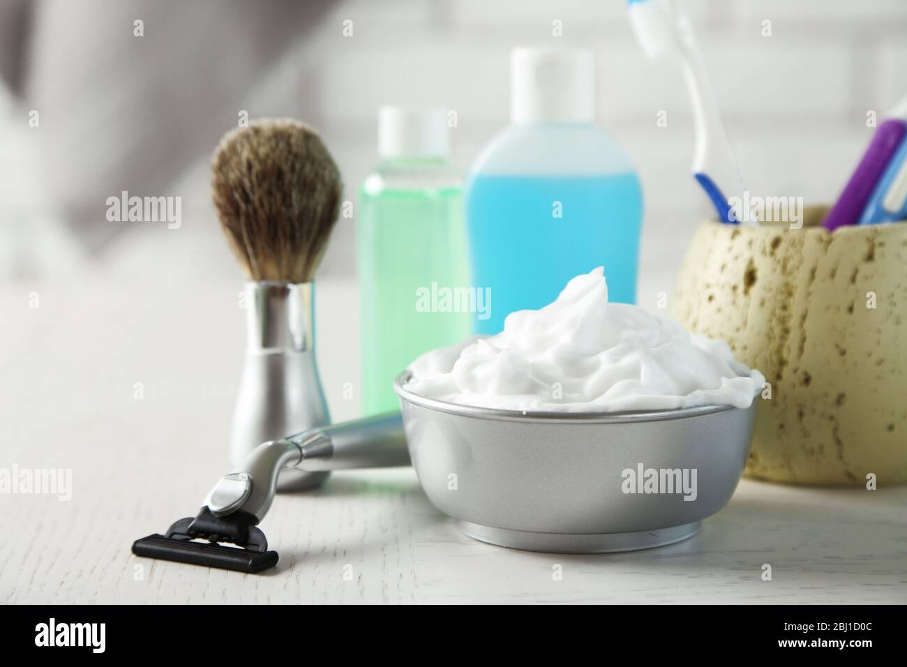 Male luxury shaving kit on shelf, on bricks wall background Stock Photo ...