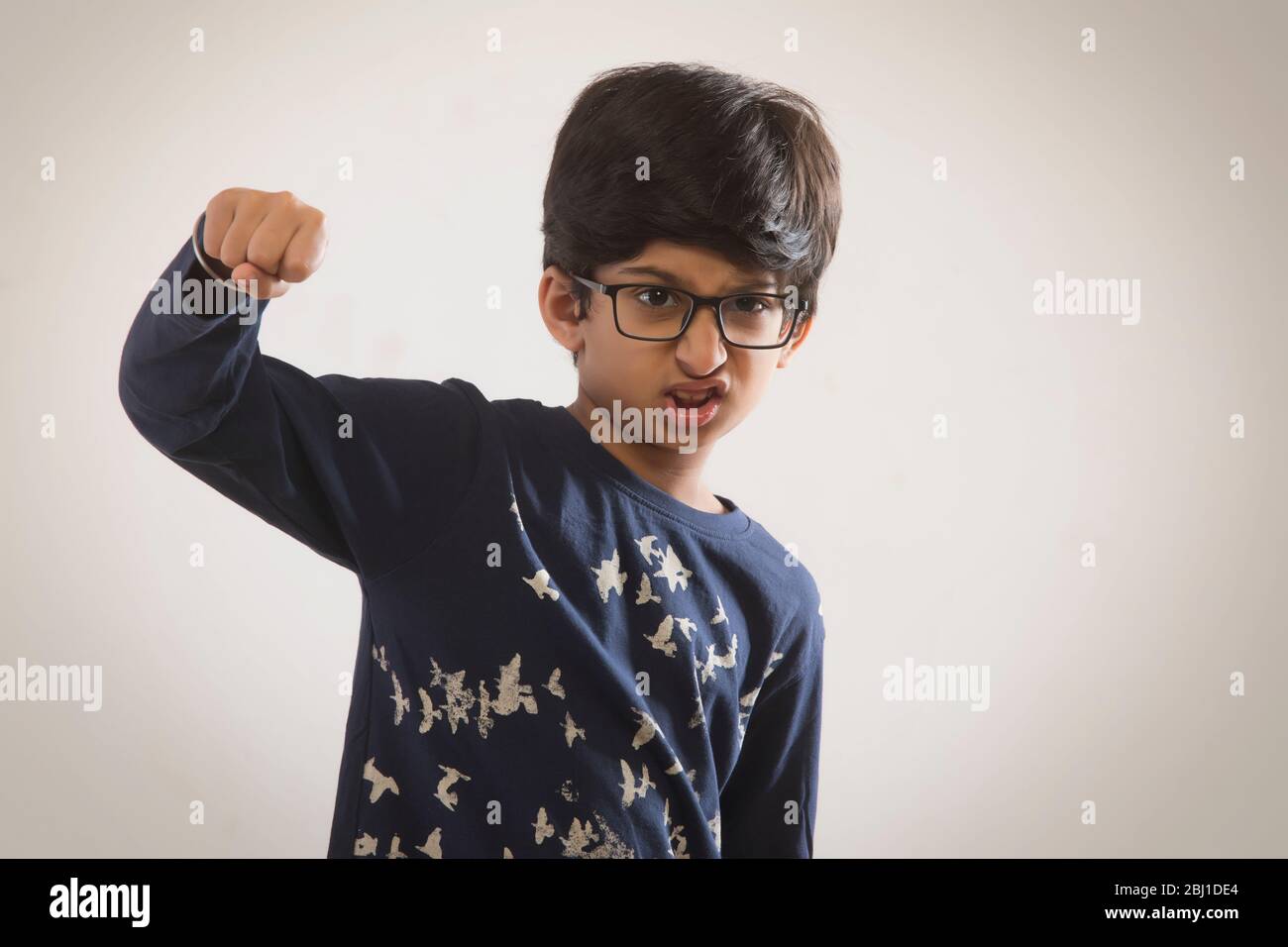 Boy punching hi-res stock photography and images - Alamy