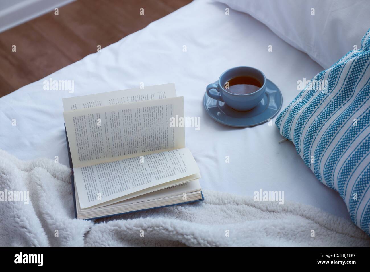 Open book laying down hi-res stock photography and images - Alamy
