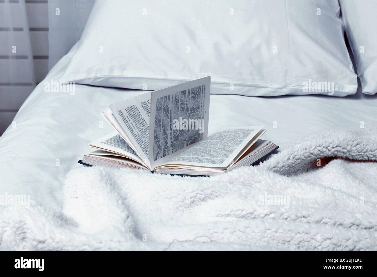 Open book on bad close-up Stock Photo - Alamy