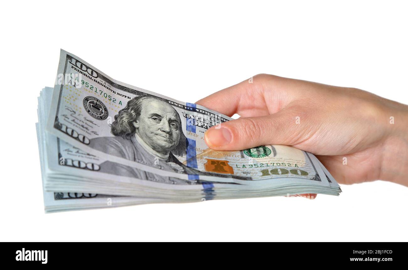 Female hand holding dollars isolated on white Stock Photo - Alamy