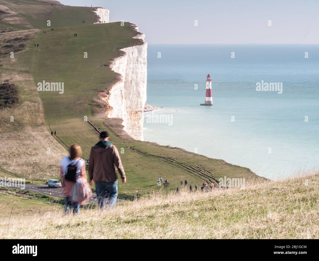 Beachy Head, South Downs, East Sussex, England. A young couple enjoying ...