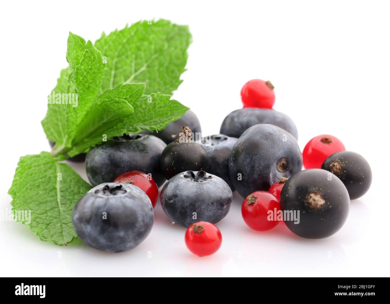 Mix of fresh berries isolated on white isolated on white Stock Photo ...