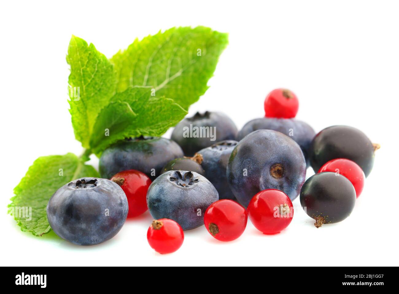 Mix of fresh berries isolated on white isolated on white Stock Photo ...
