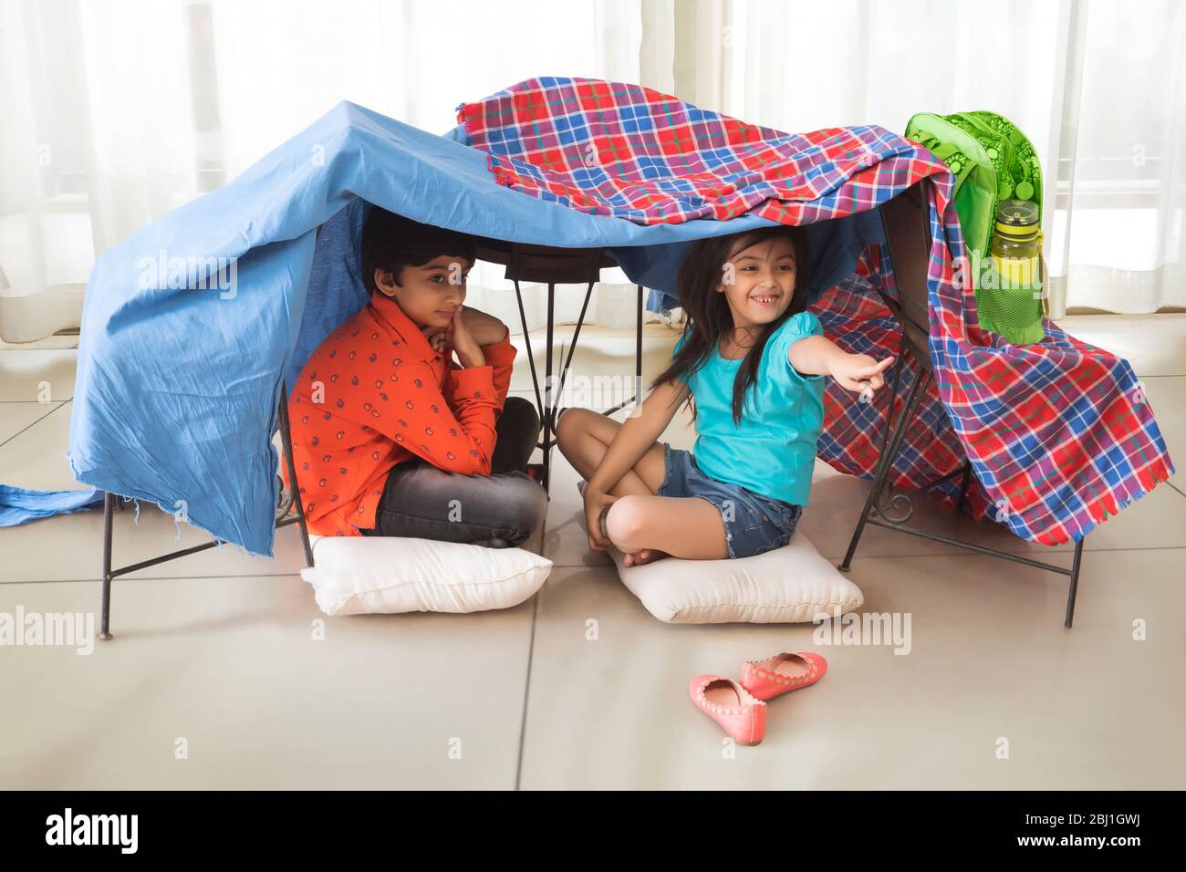 brother and sister camping at home Stock Photo - Alamy