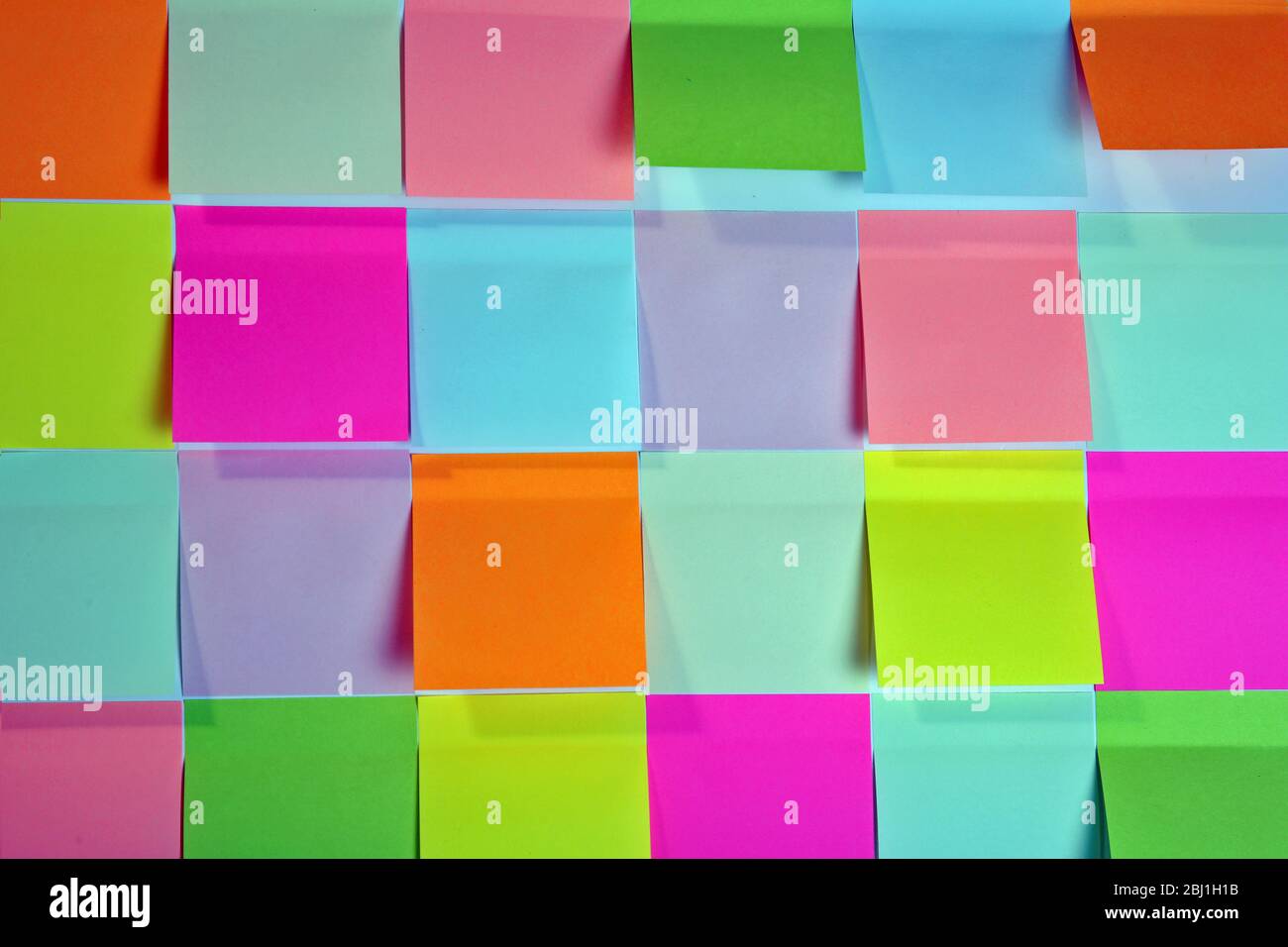 Colorful paper notes background Stock Photo - Alamy