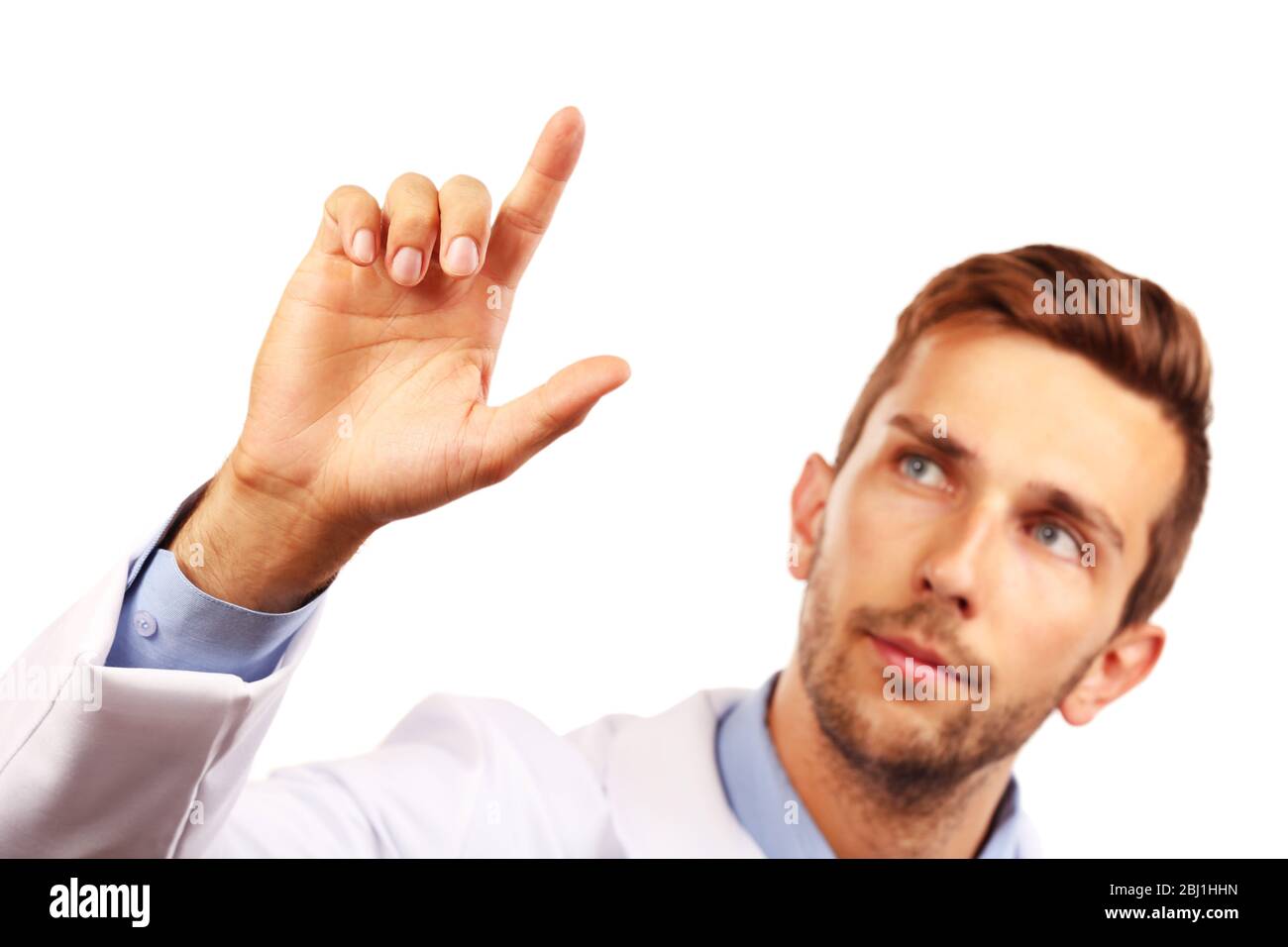 Doctor pointing his finger up isolated on white Stock Photo - Alamy
