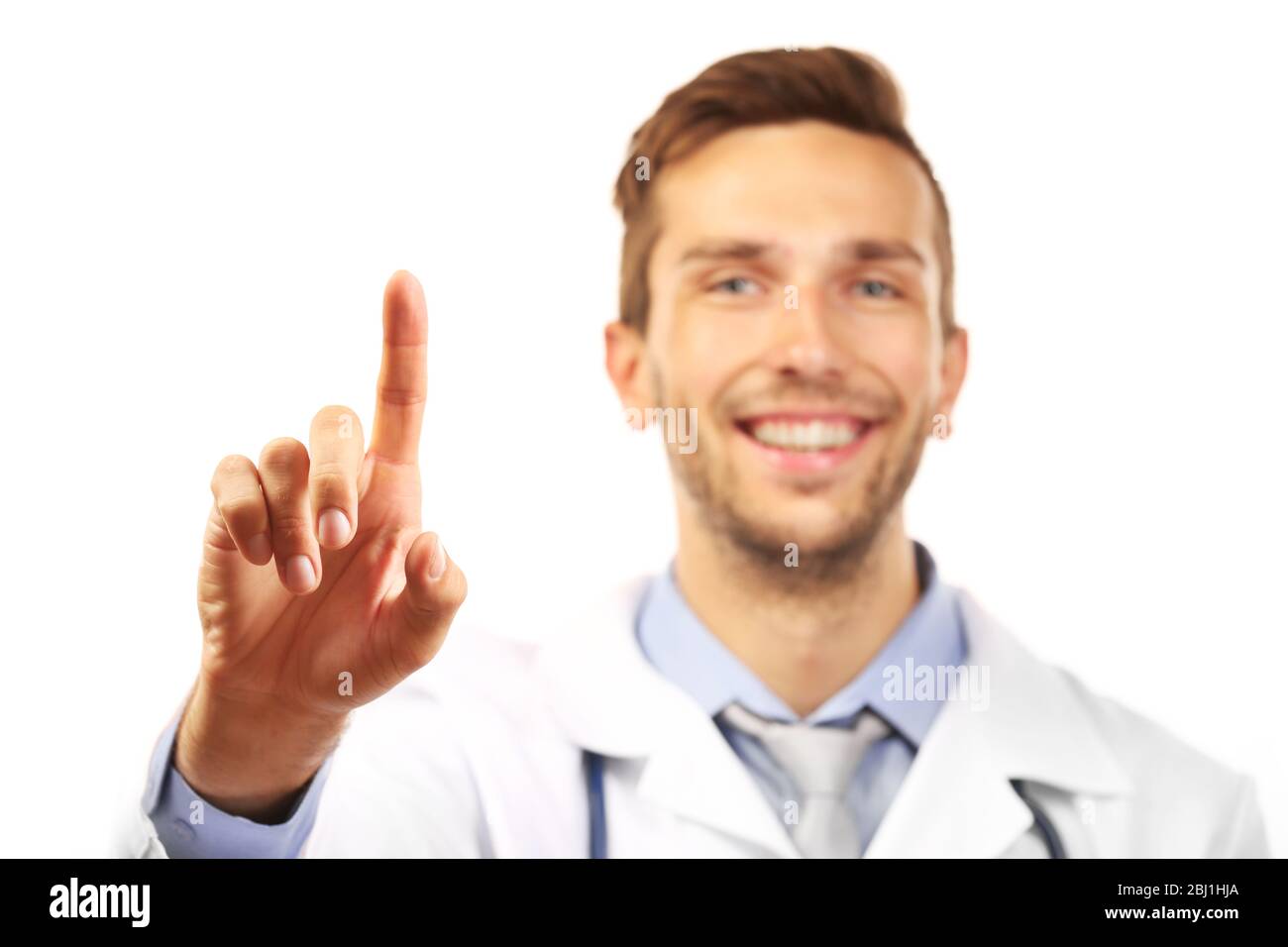 Doctor pointing his finger up isolated on white Stock Photo - Alamy