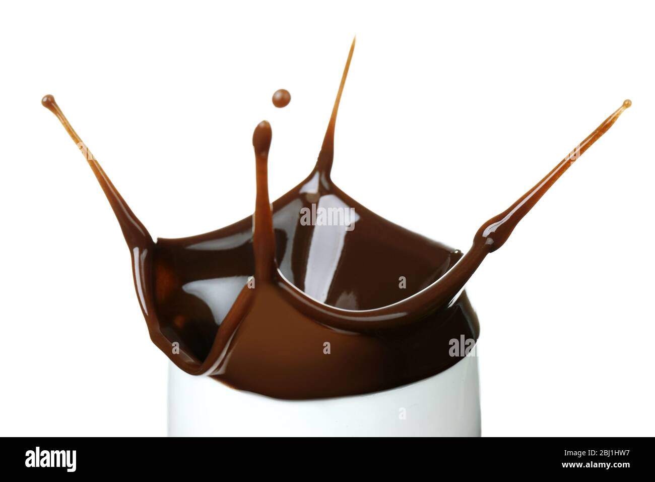 Splash of hot chocolate in cup isolated on white Stock Photo - Alamy