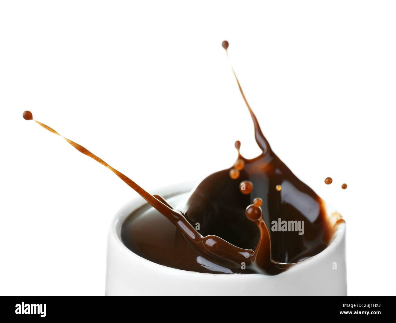 Splash of hot chocolate in cup isolated on white Stock Photo - Alamy