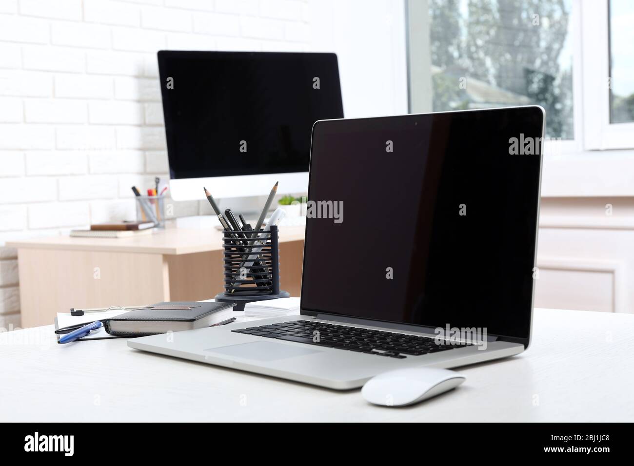Workplace with computer in office Stock Photo - Alamy