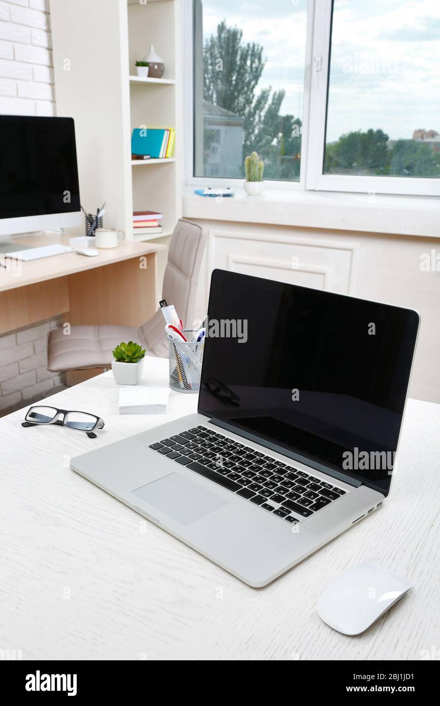 Workplace with computer in office Stock Photo - Alamy