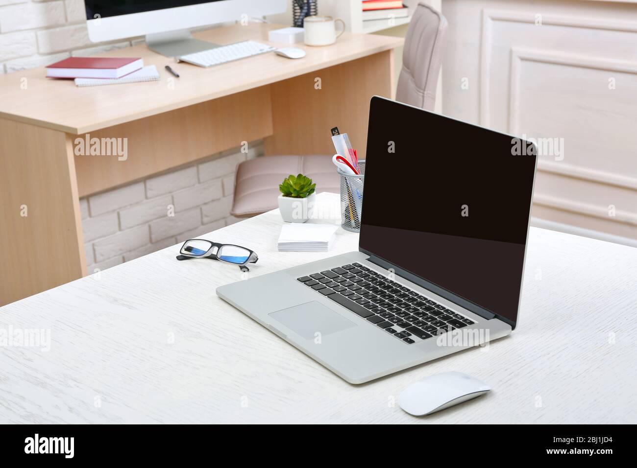 Workplace with computer in office Stock Photo - Alamy