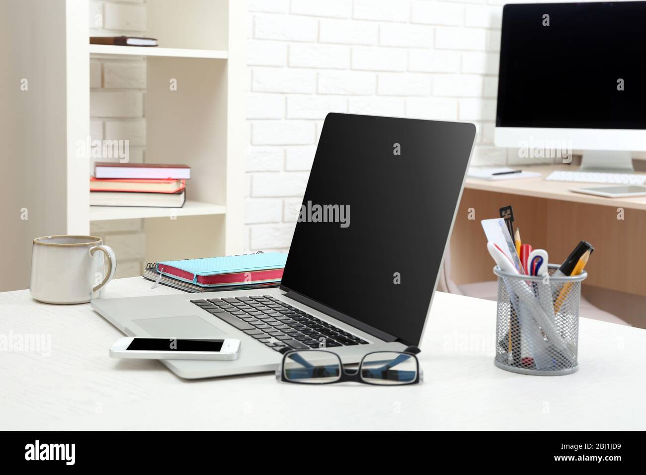 Workplace with computer in office Stock Photo - Alamy