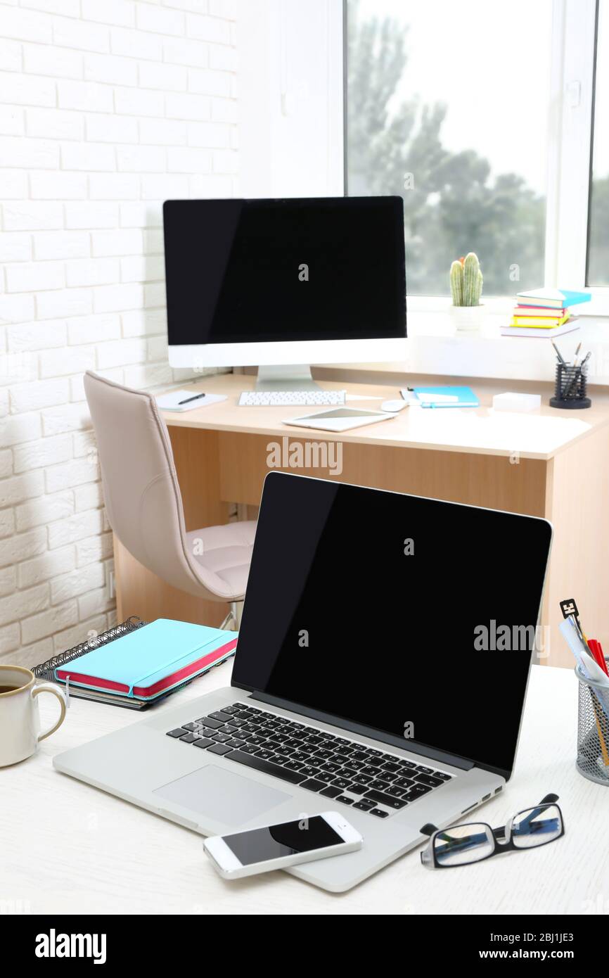Workplace with computer in office Stock Photo - Alamy